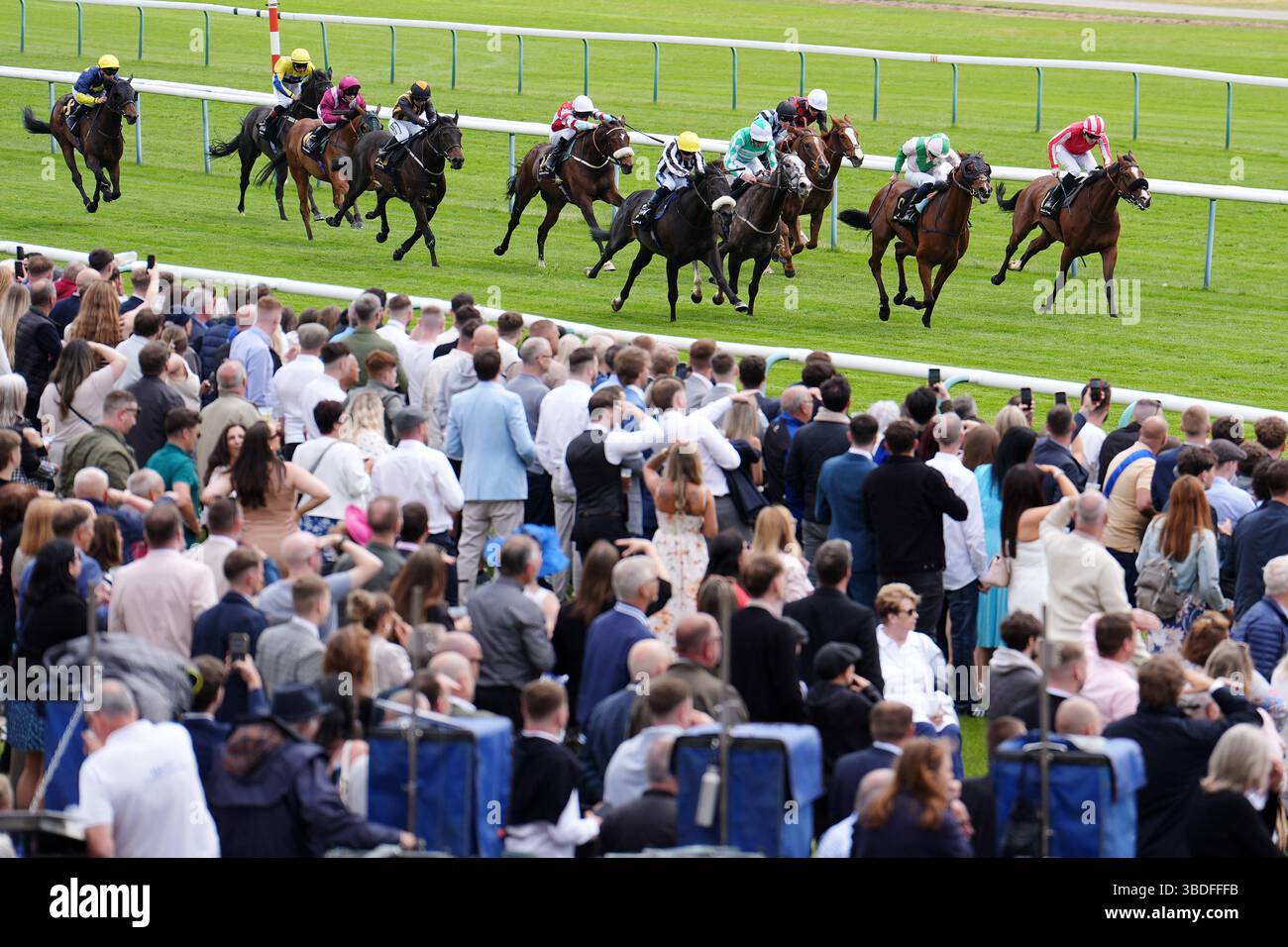 Great Chieftain ridden by William Buick (second right) on their way to ...