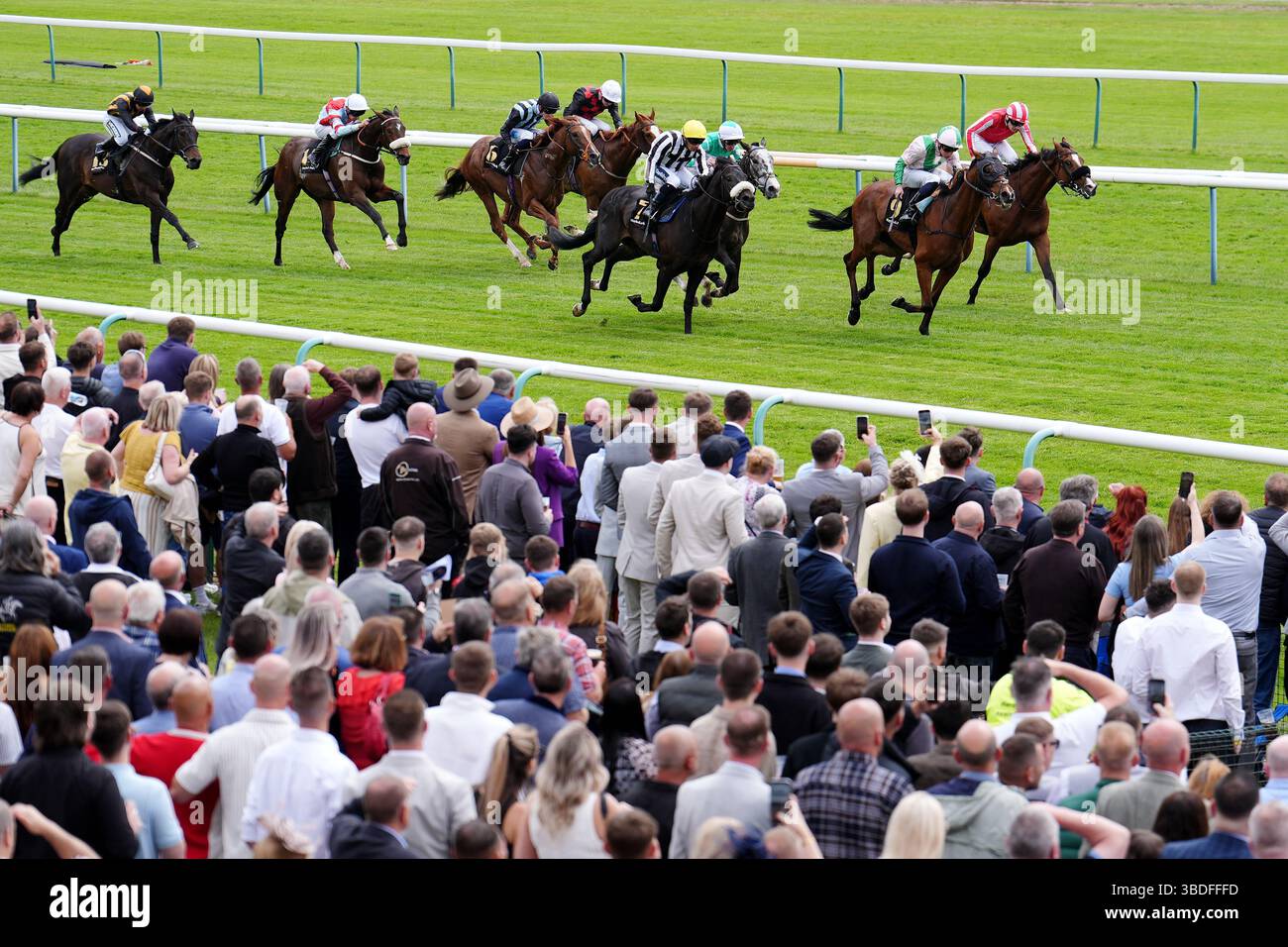 Great Chieftain ridden by William Buick (second right) on their way to ...