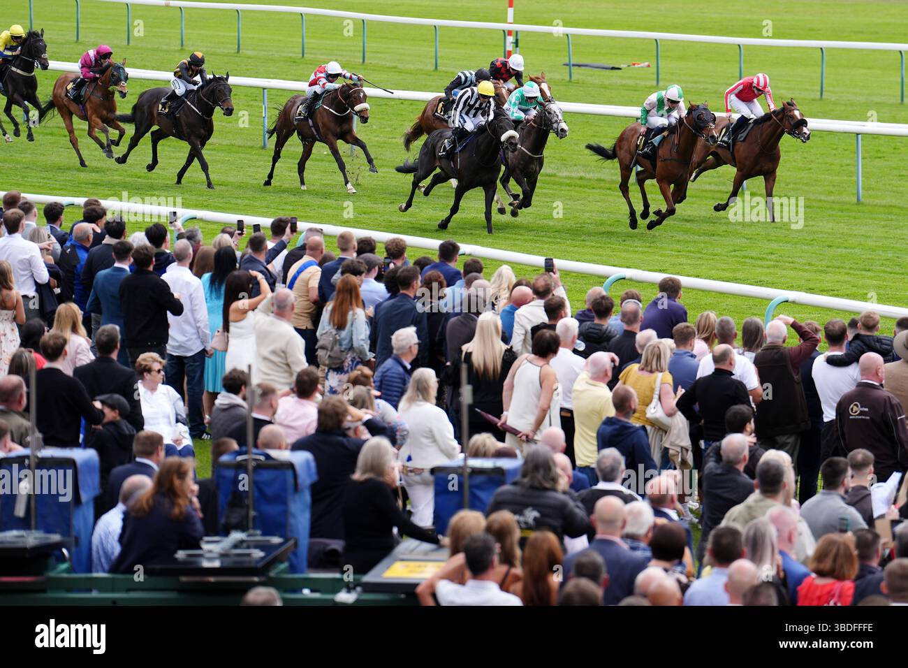 Great Chieftain ridden by William Buick (second right) on their way to ...