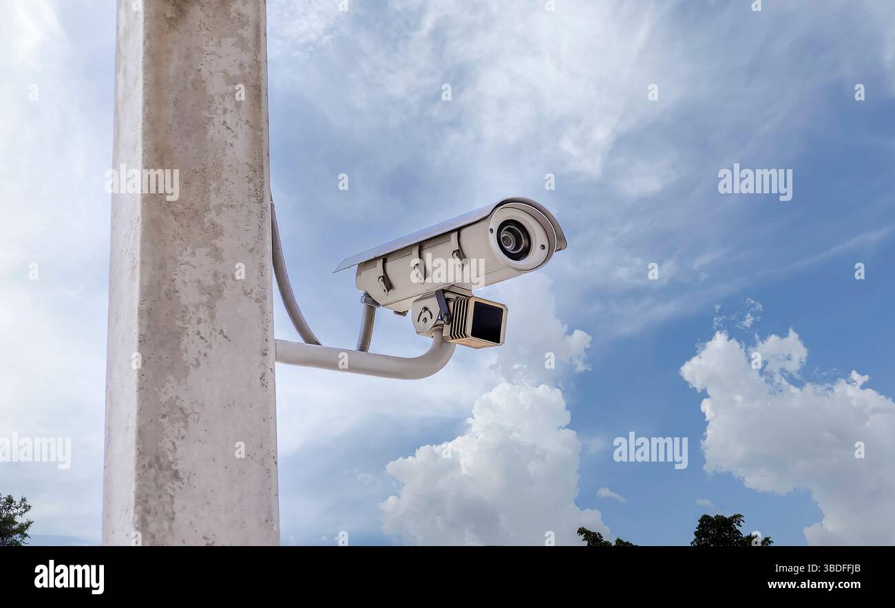 Install CCTV cameras outside the building, sky and cloud background ...