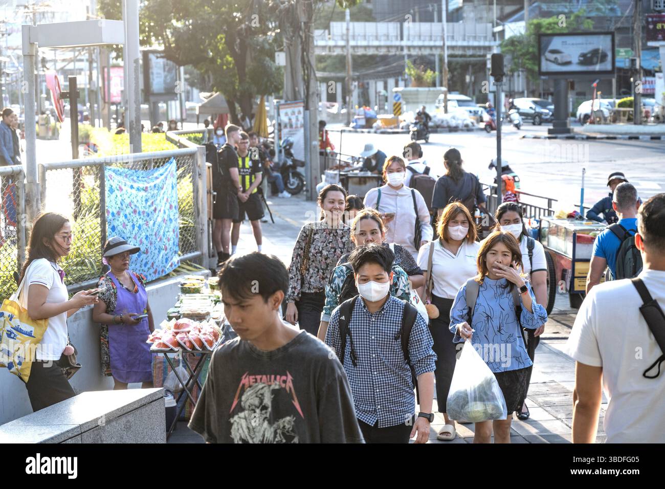 Bangkok, Thailand. March 25th 2025. Thai commuters enter and exit the ...