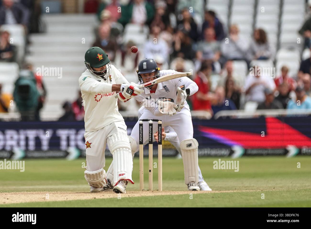 Nottingham, UK. 24th May, 2025. Sikandar Raza of Zimbabwe hits a four ...