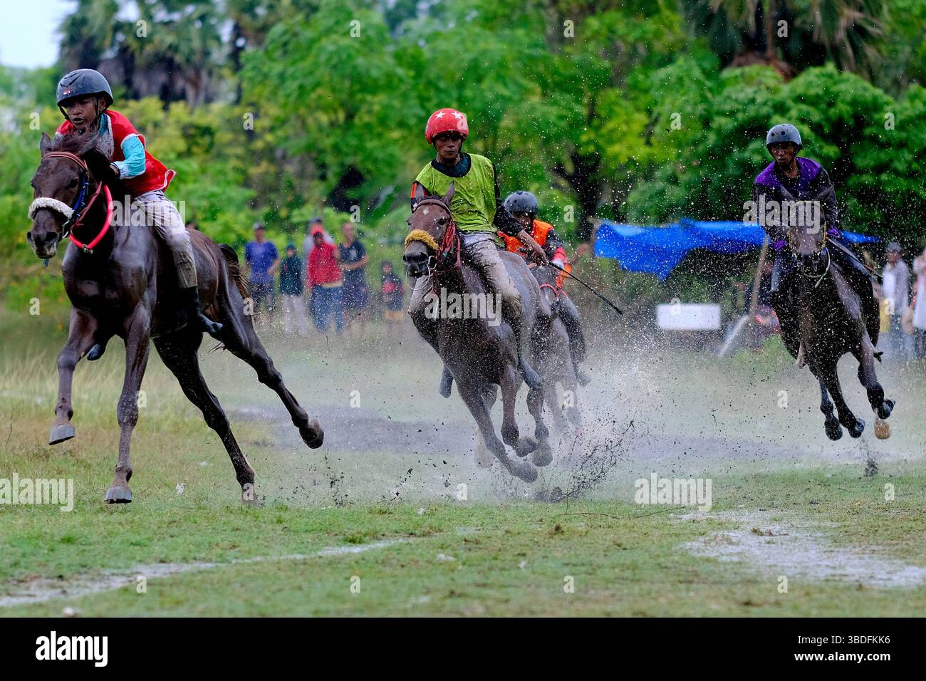 South Sulawesi, Indonesia. 24th May, 2025. Jockeys compete during a ...