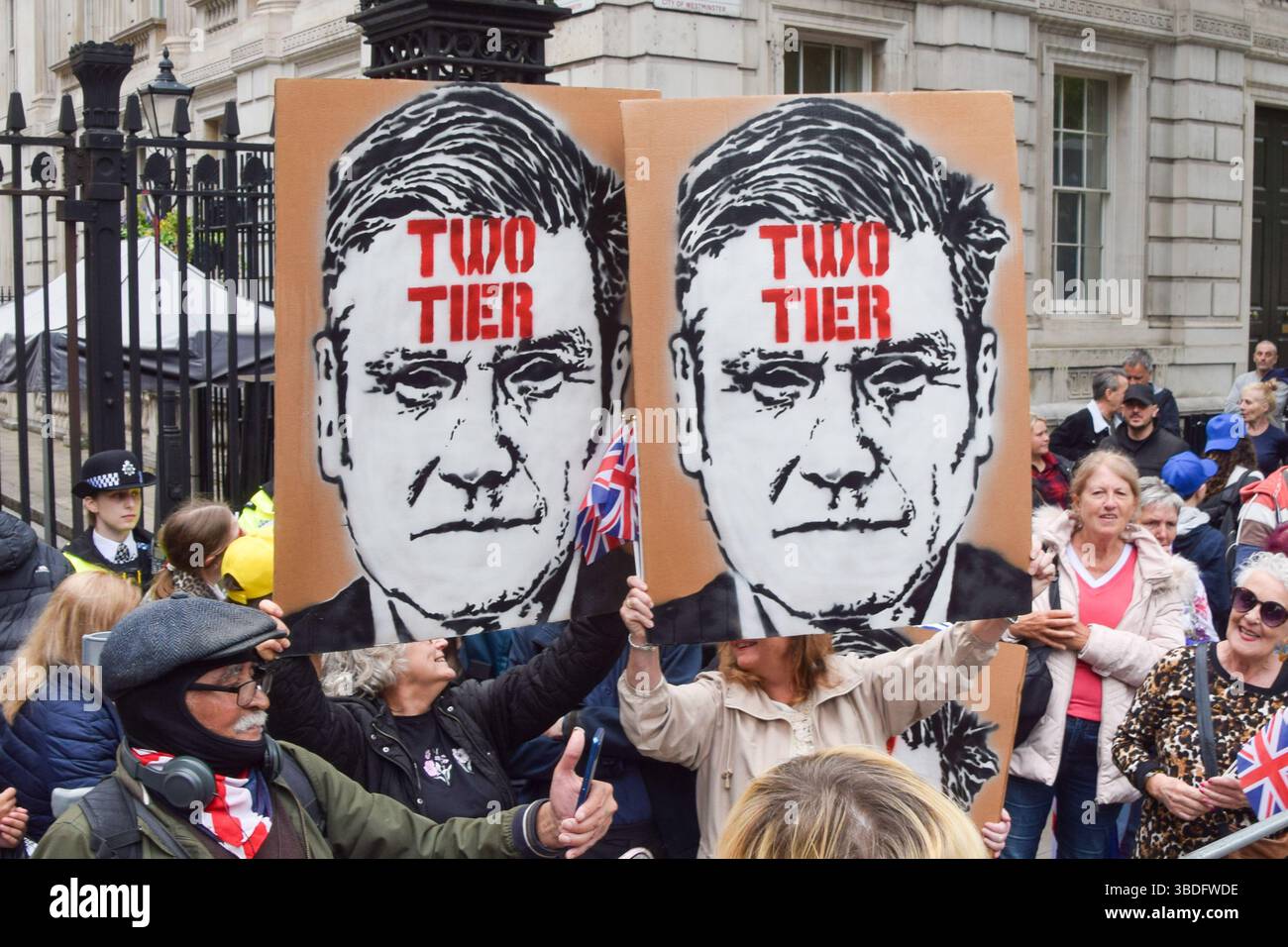 London, UK. 24th May 2025. Protesters hold signs referring to Keir ...