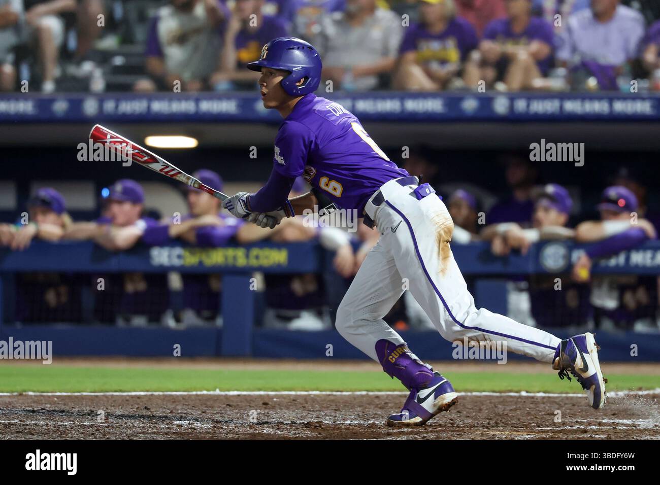 HOOVER, AL - MAY 23: LSU outfielder Derek Curiel (6) watches the ball ...