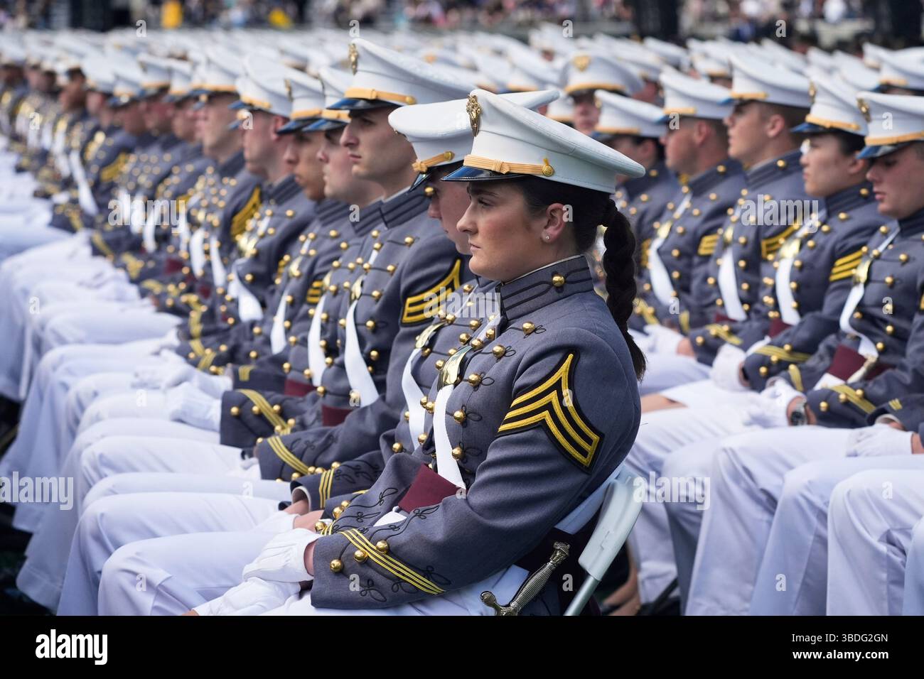 United States Military Academy graduating cadets sit during ...