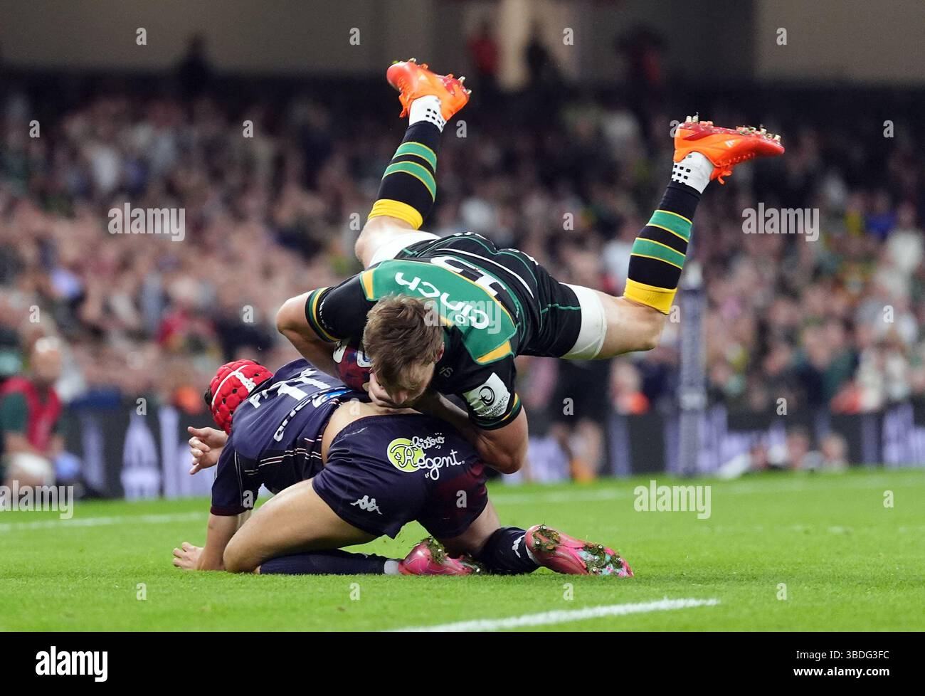 Northampton Saints' Rory Hutchinson is tackled by Union Bordeaux-Begles ...