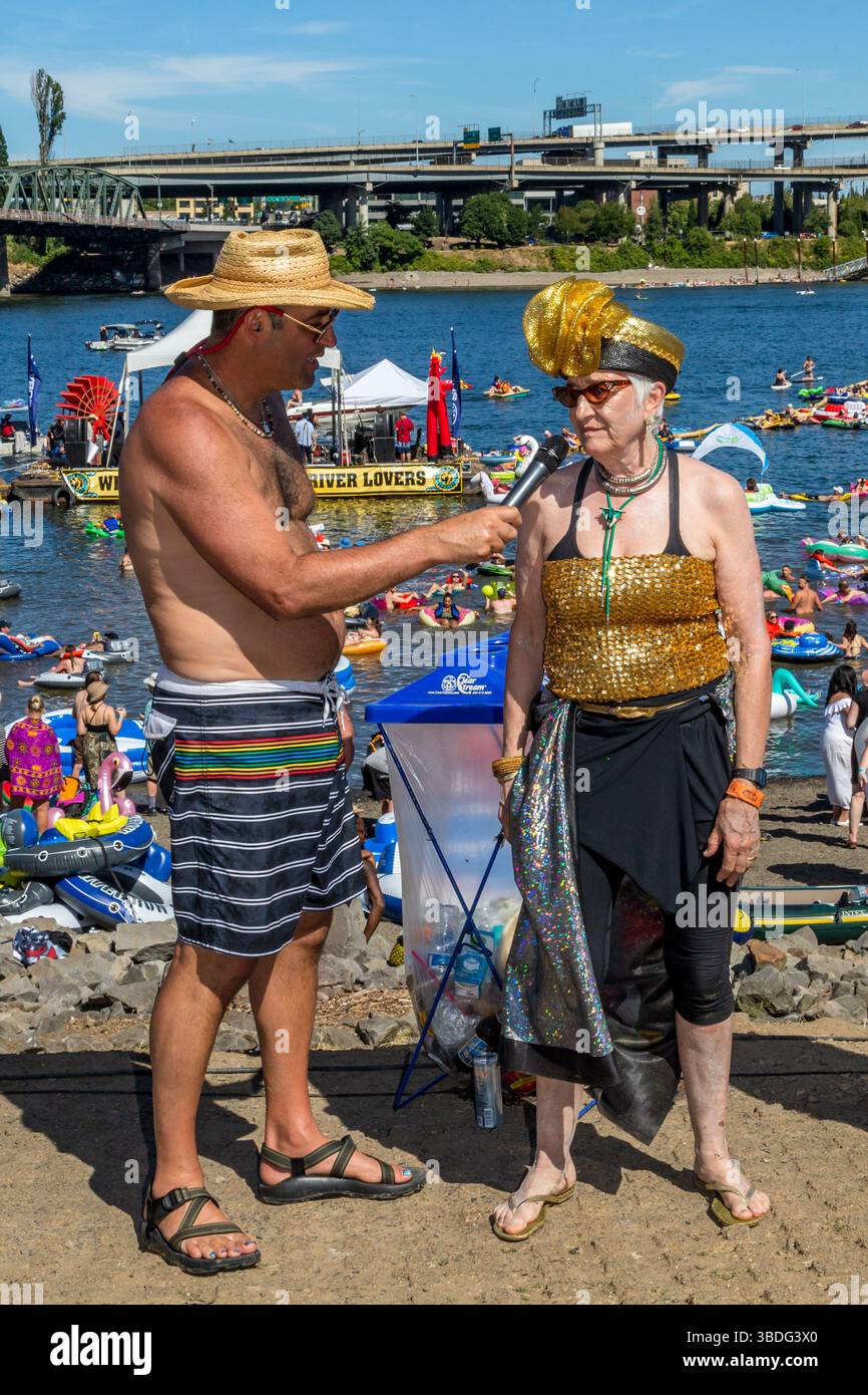 The Big Float, Portland, Oregon - July 14th 2018: A man interviews a ...