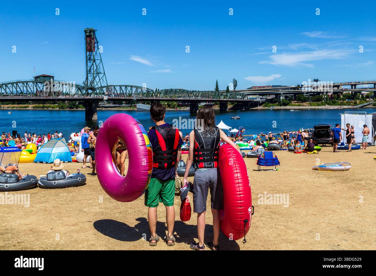 The Big Float, Portland, Oregon - July 14th 2018: Two people with inner ...