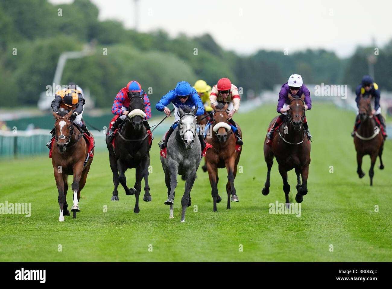 Symbol Of Honour ridden by William Buick (centre left) on their way to ...