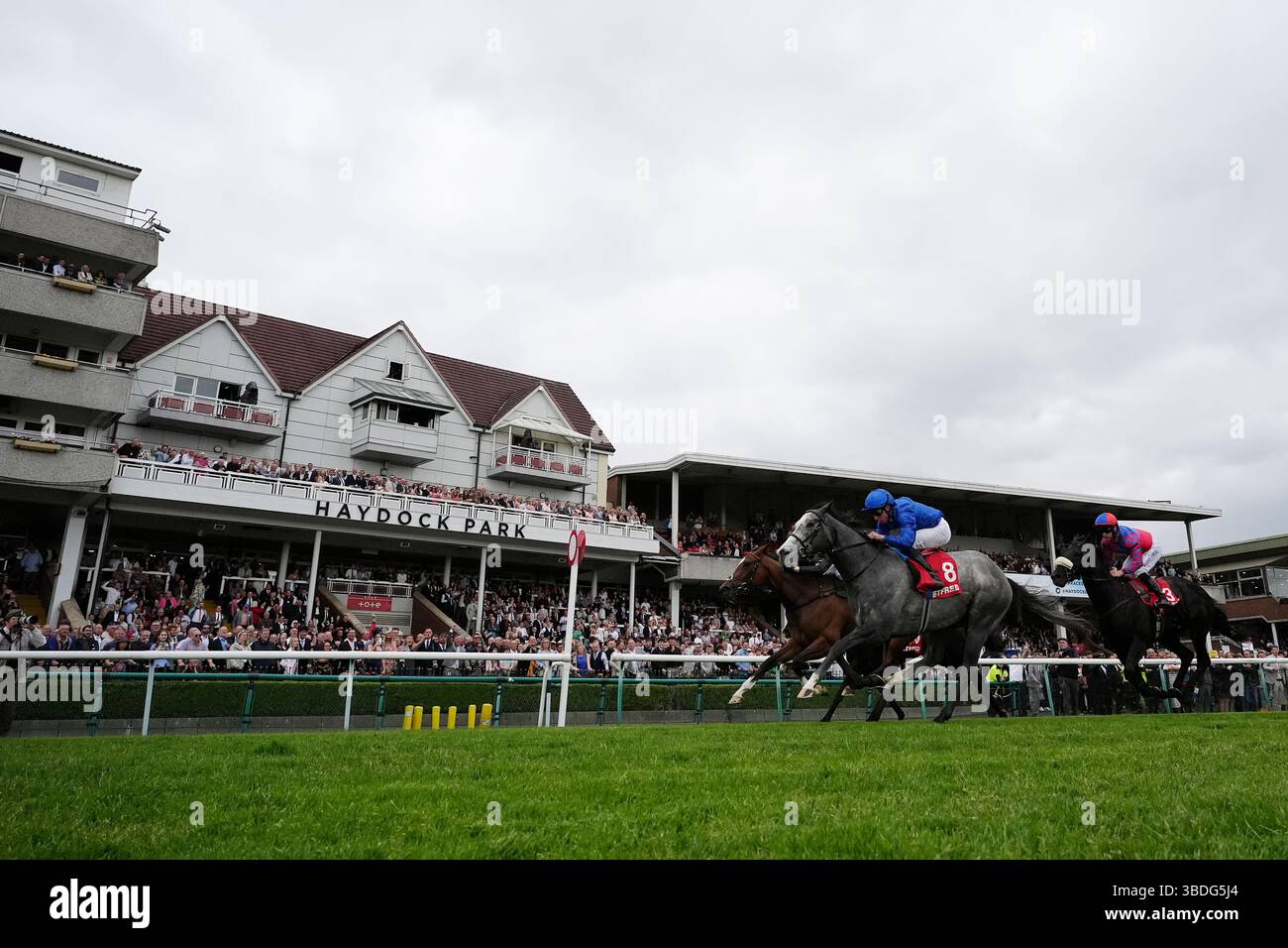 Symbol Of Honour ridden by William Buick (second left) on their way to ...