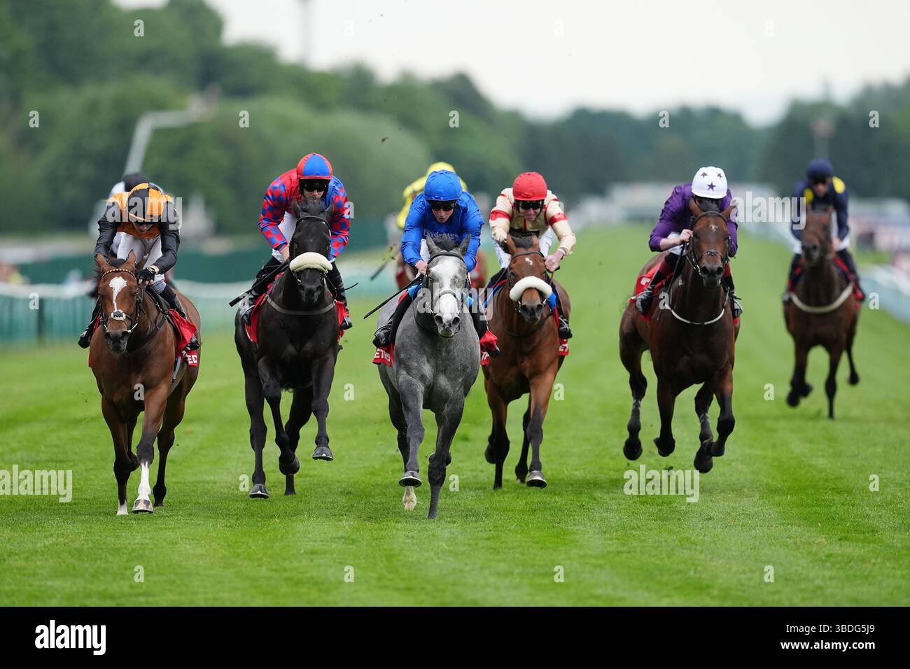 Symbol Of Honour ridden by William Buick (centre left) on their way to ...