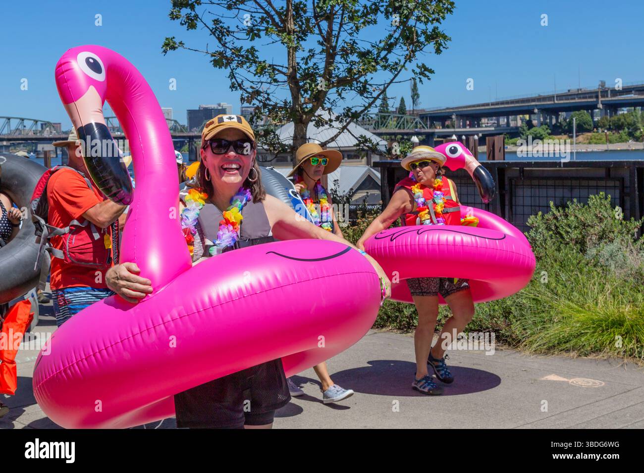 The Big Float, Portland, Oregon - July 14th 2018: People carry pink ...