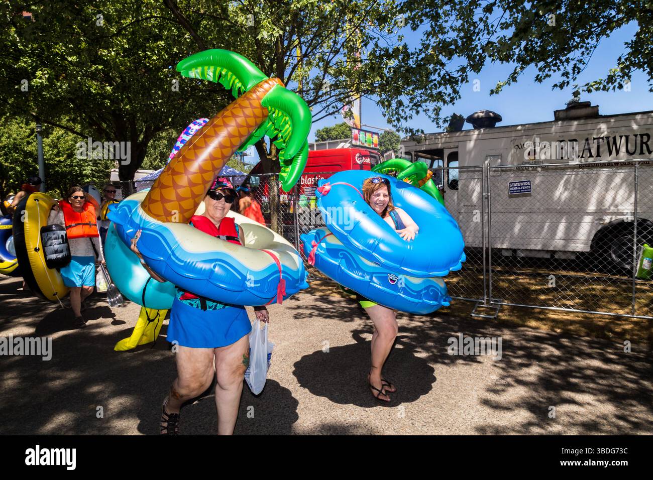 The Big Float, Portland, Oregon - July 14th 2018: People carry ...