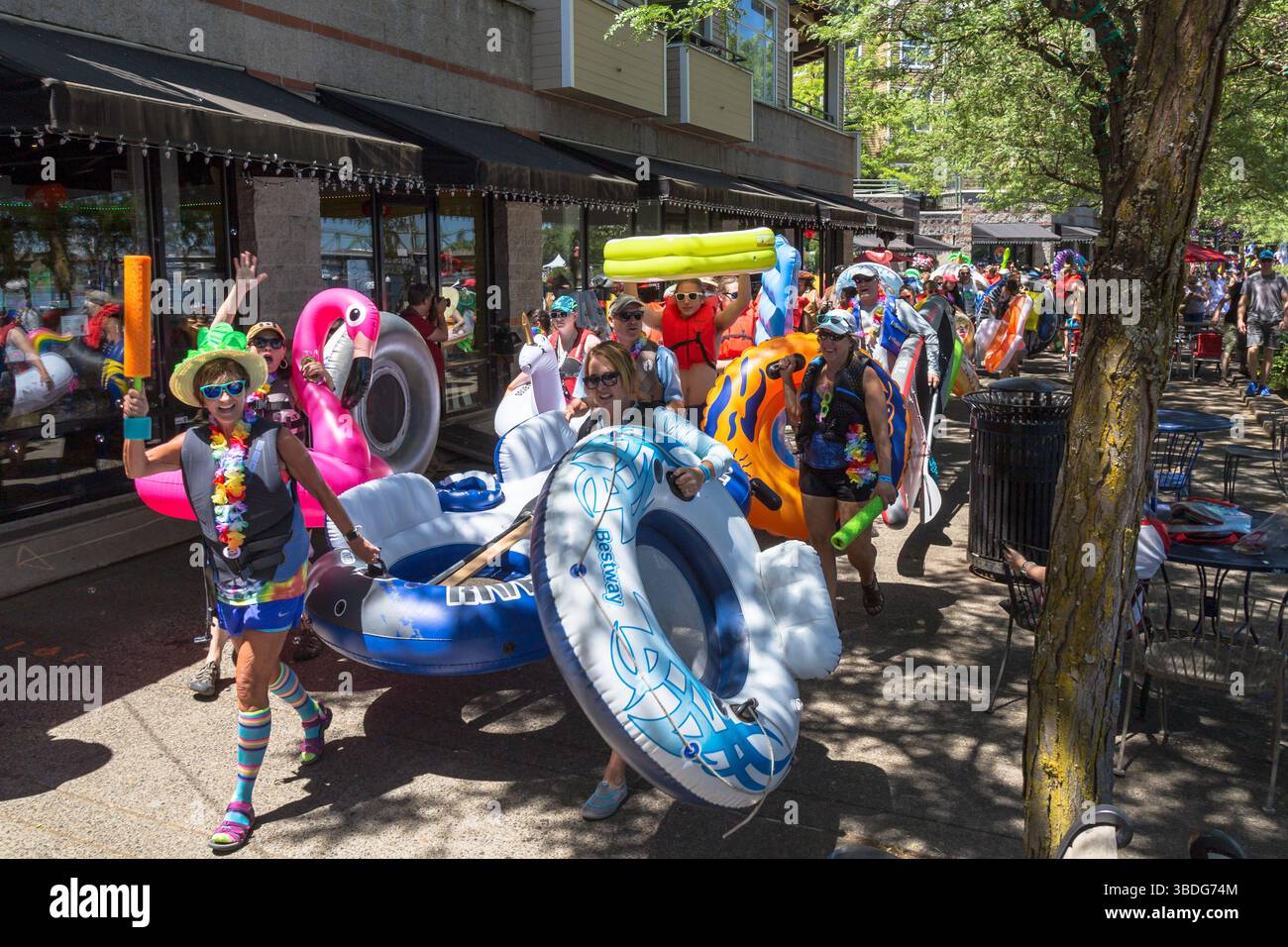 The Big Float, Portland, Oregon - July 14th 2018: People parade with ...