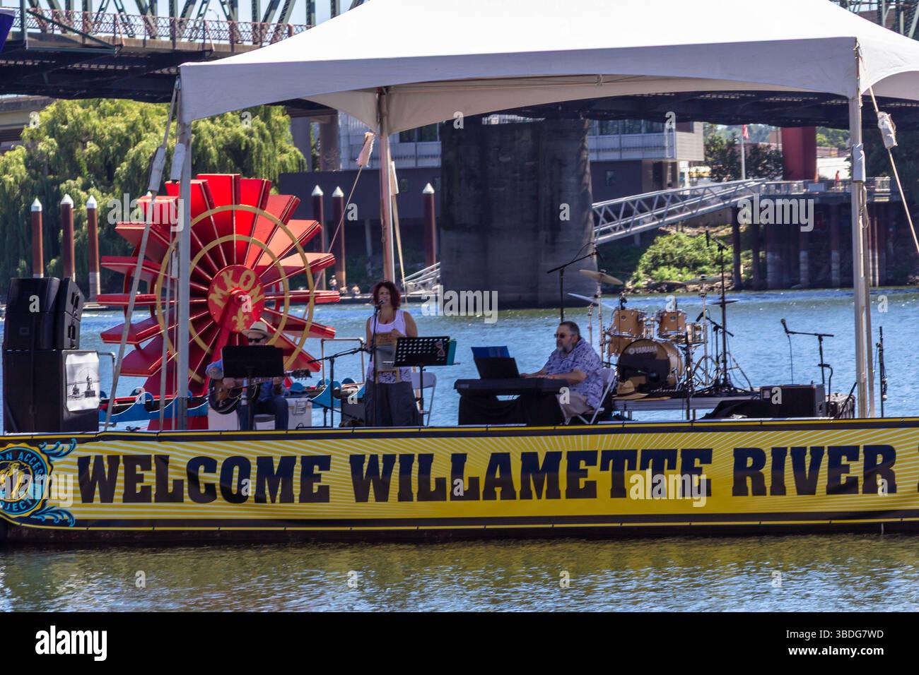 The Big Float, Portland, Oregon - July 14th 2018: A band performs on a floating stage to ...