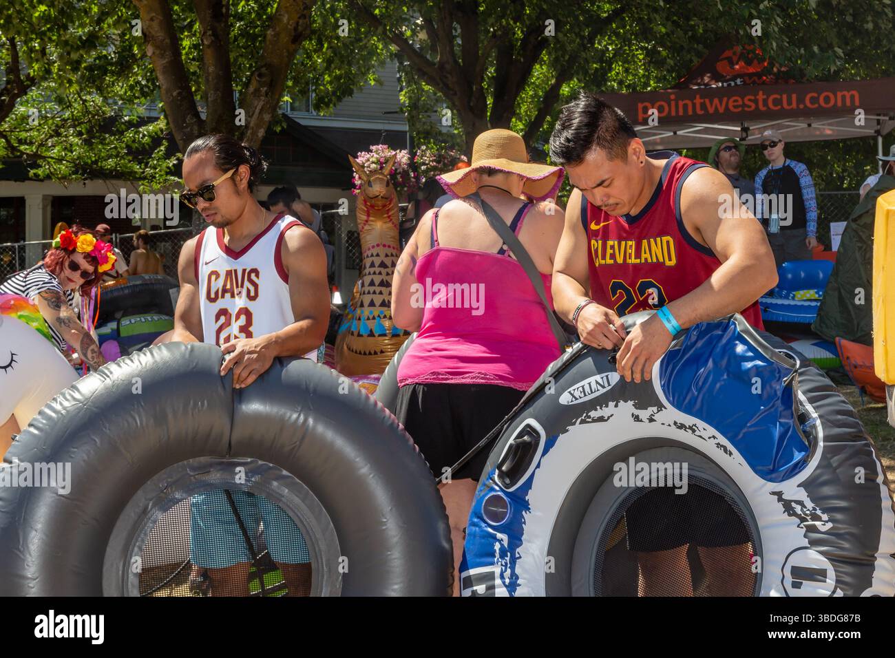 The Big Float, Portland, Oregon - July 14th 2018: People inflate inner ...
