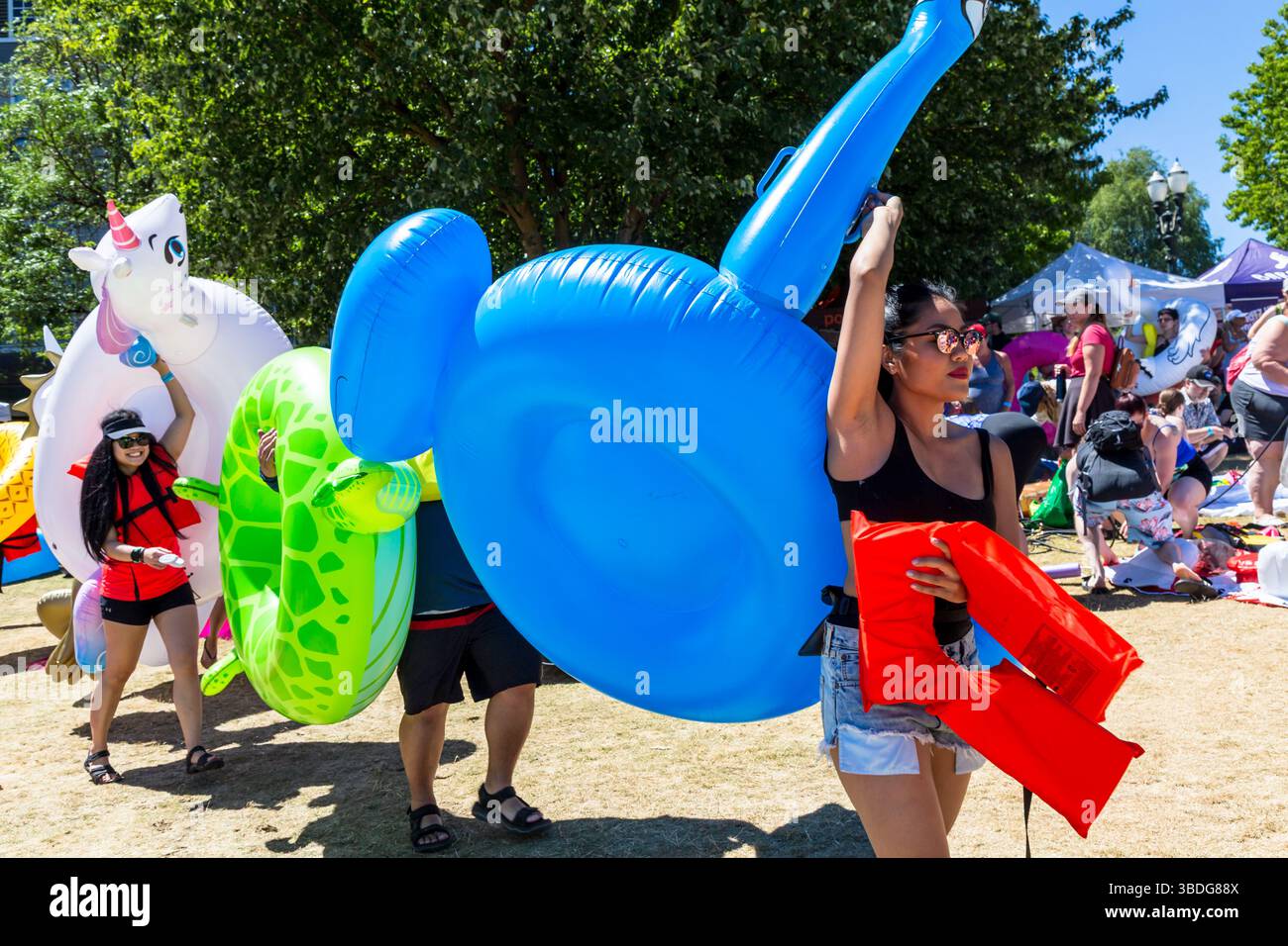 The Big Float, Portland, Oregon - July 14th 2018. People carry ...