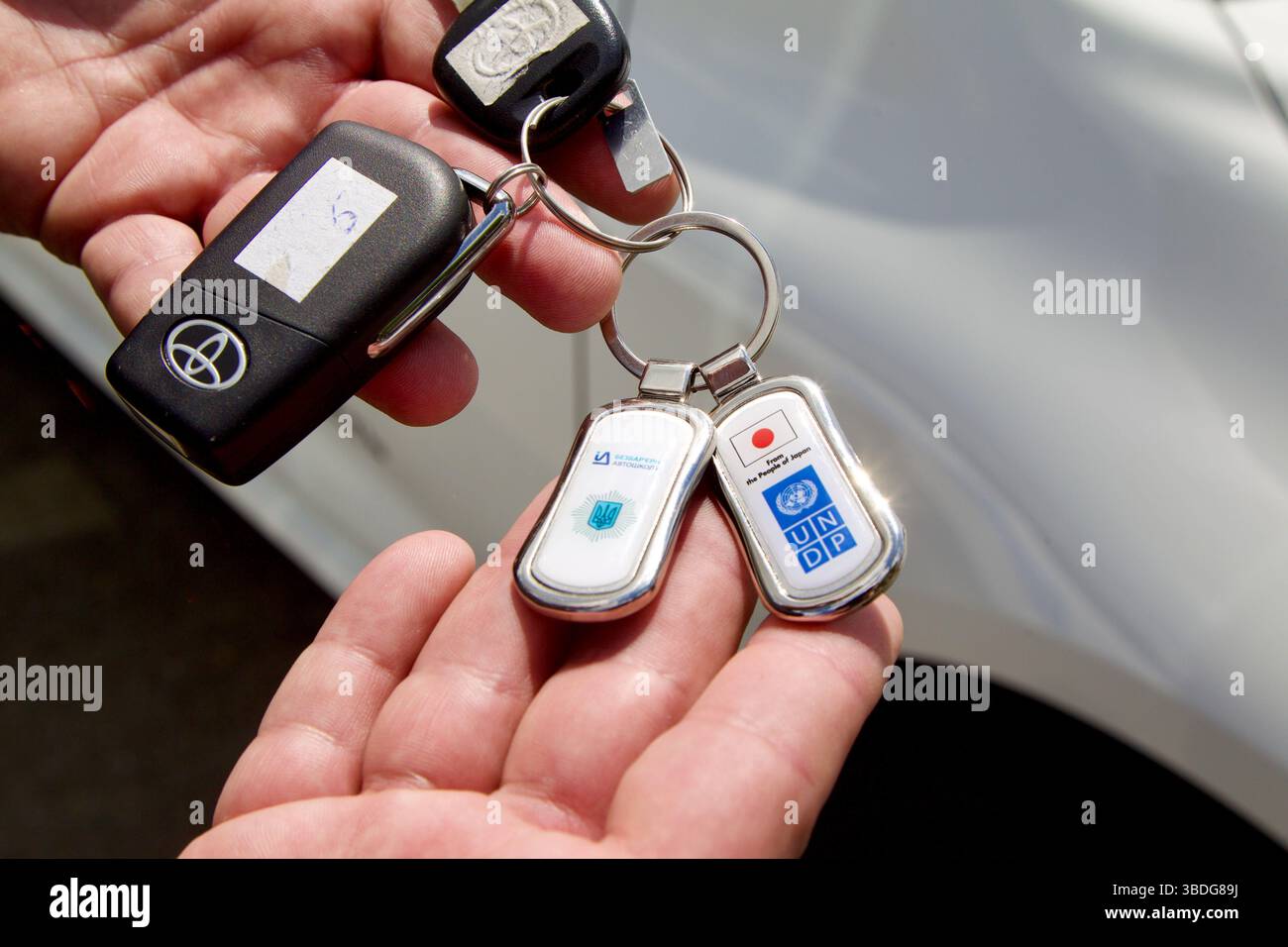 Car key handover hi-res stock photography and images - Alamy