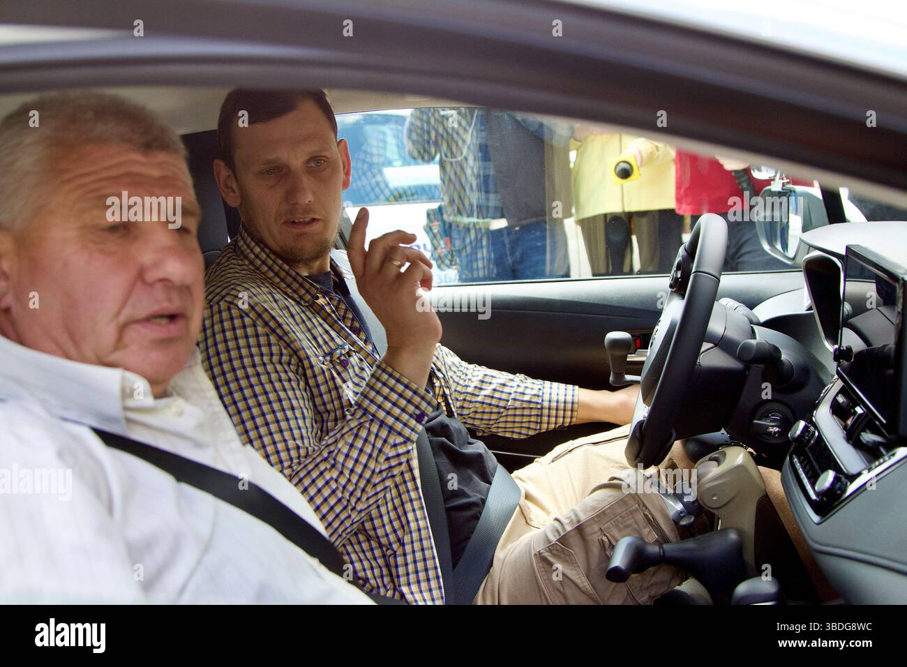 Non Exclusive: A driver with a prosthetic leg is seen behind the wheel ...
