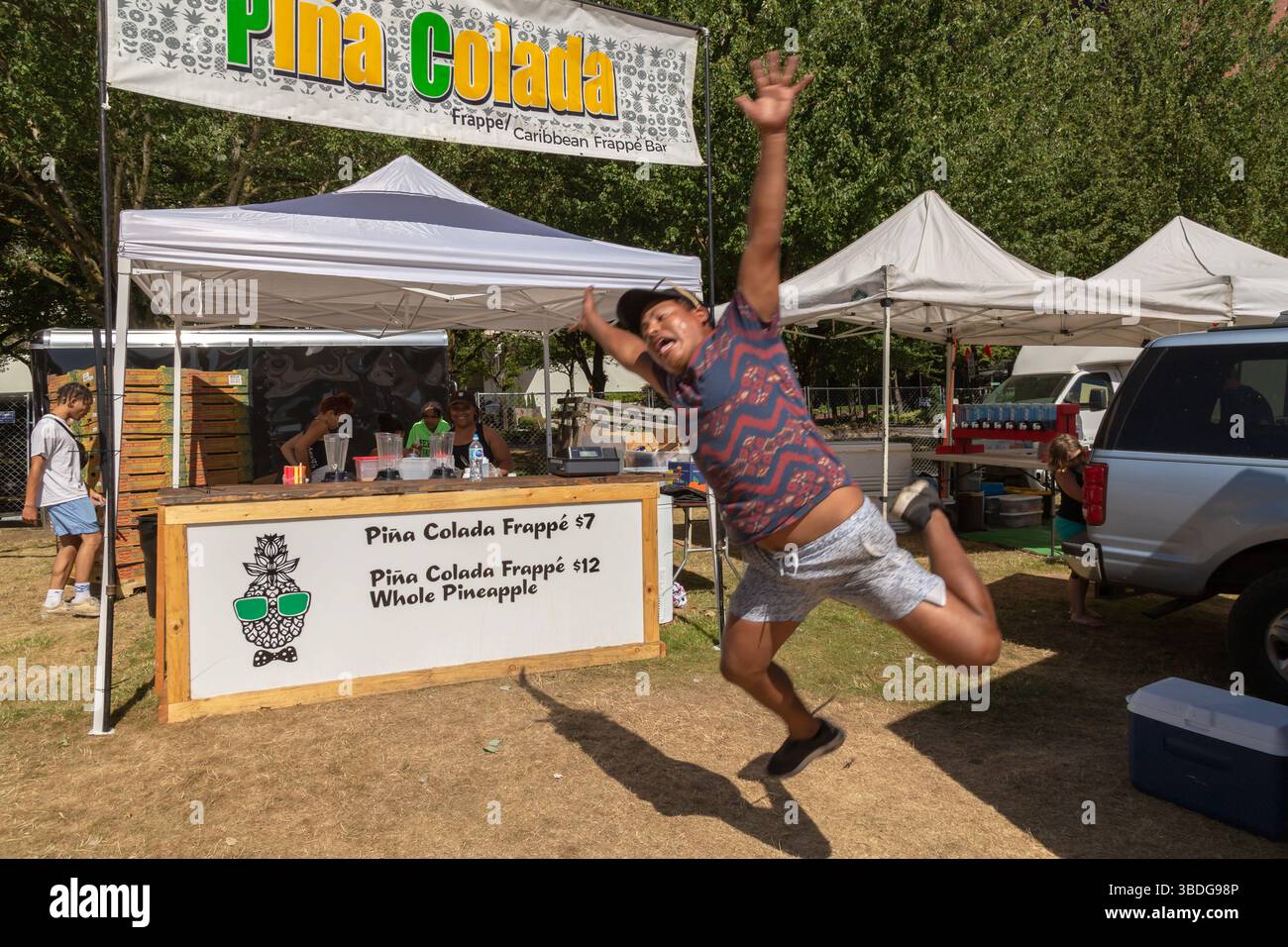 The Big Float, Portland, Oregon - July 14th 2018: A man jumps for joy ...