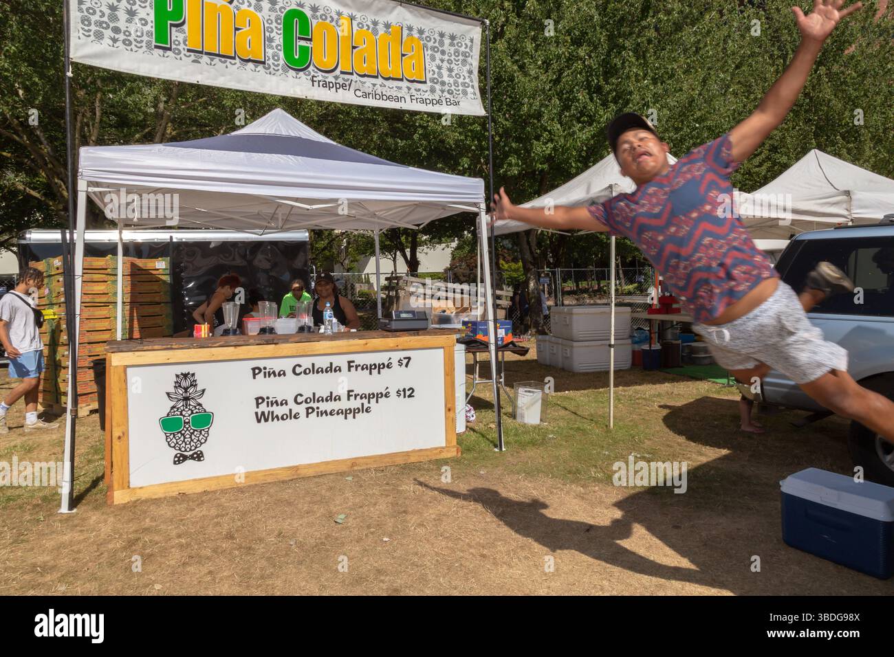 The Big Float, Portland, Oregon - July 14th 2018: A man jumps in front ...