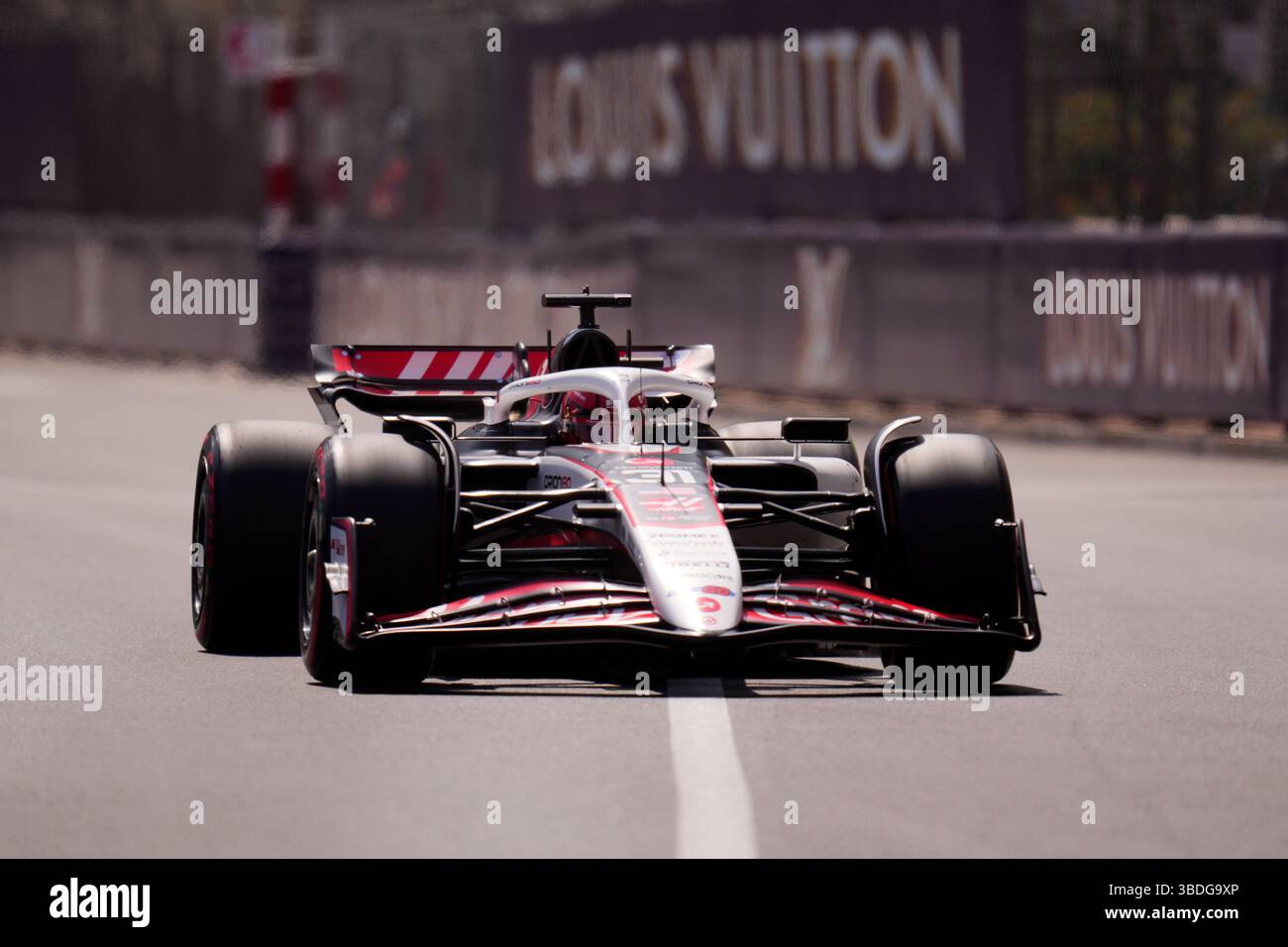 Haas driver Esteban Ocon of France steers his car during the qualifying ...