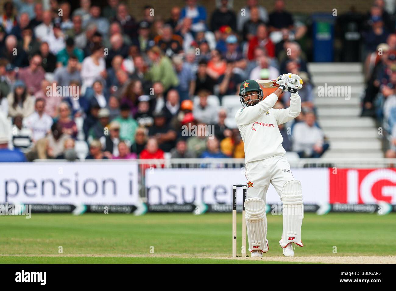 Nottingham, UK. 24th May, 2025. #24, Sikandar Raza of Zimbabwe hits it ...
