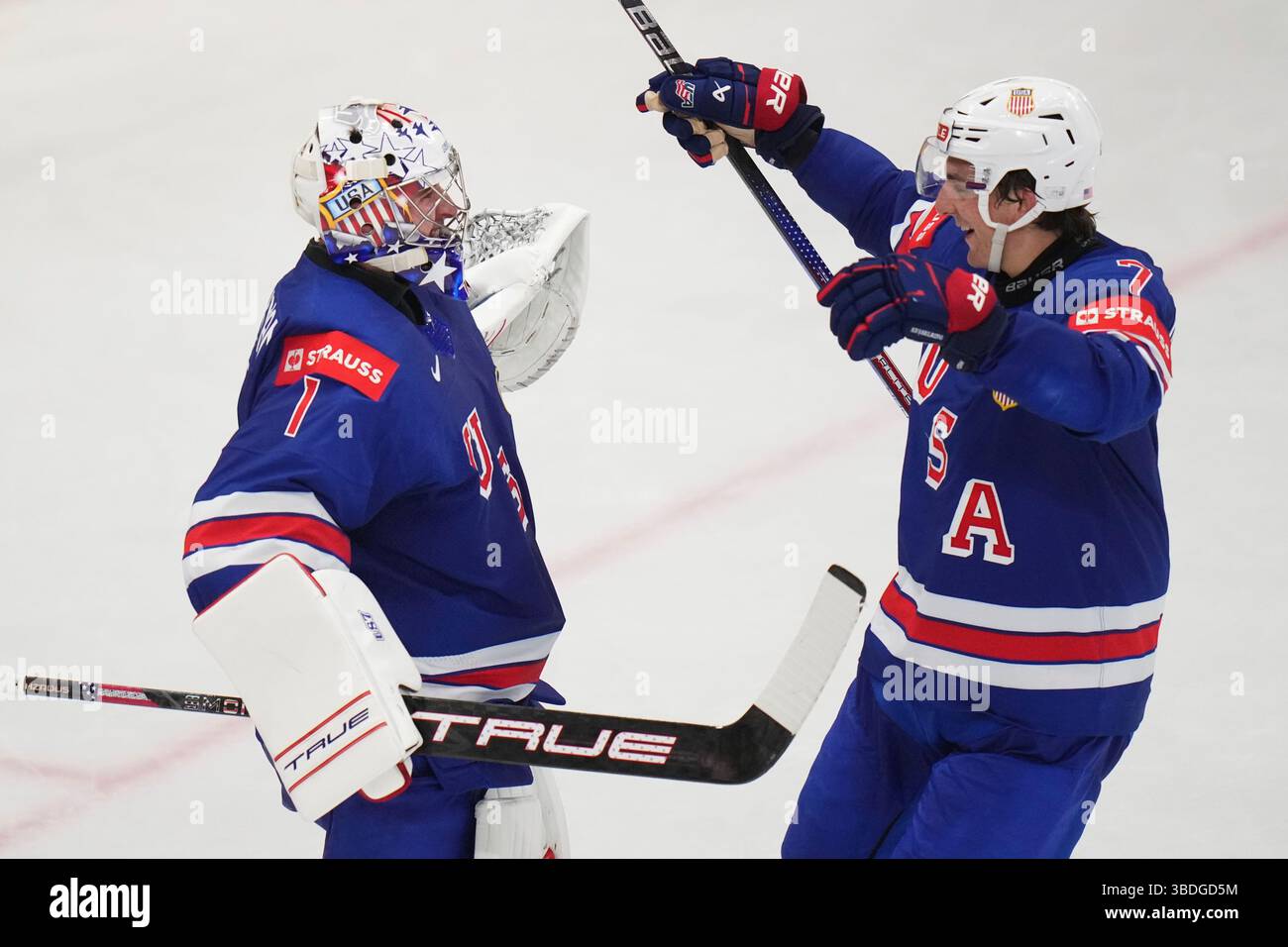 United States' goalkeeper Jeremy Swayman and Michael Kesselring ...