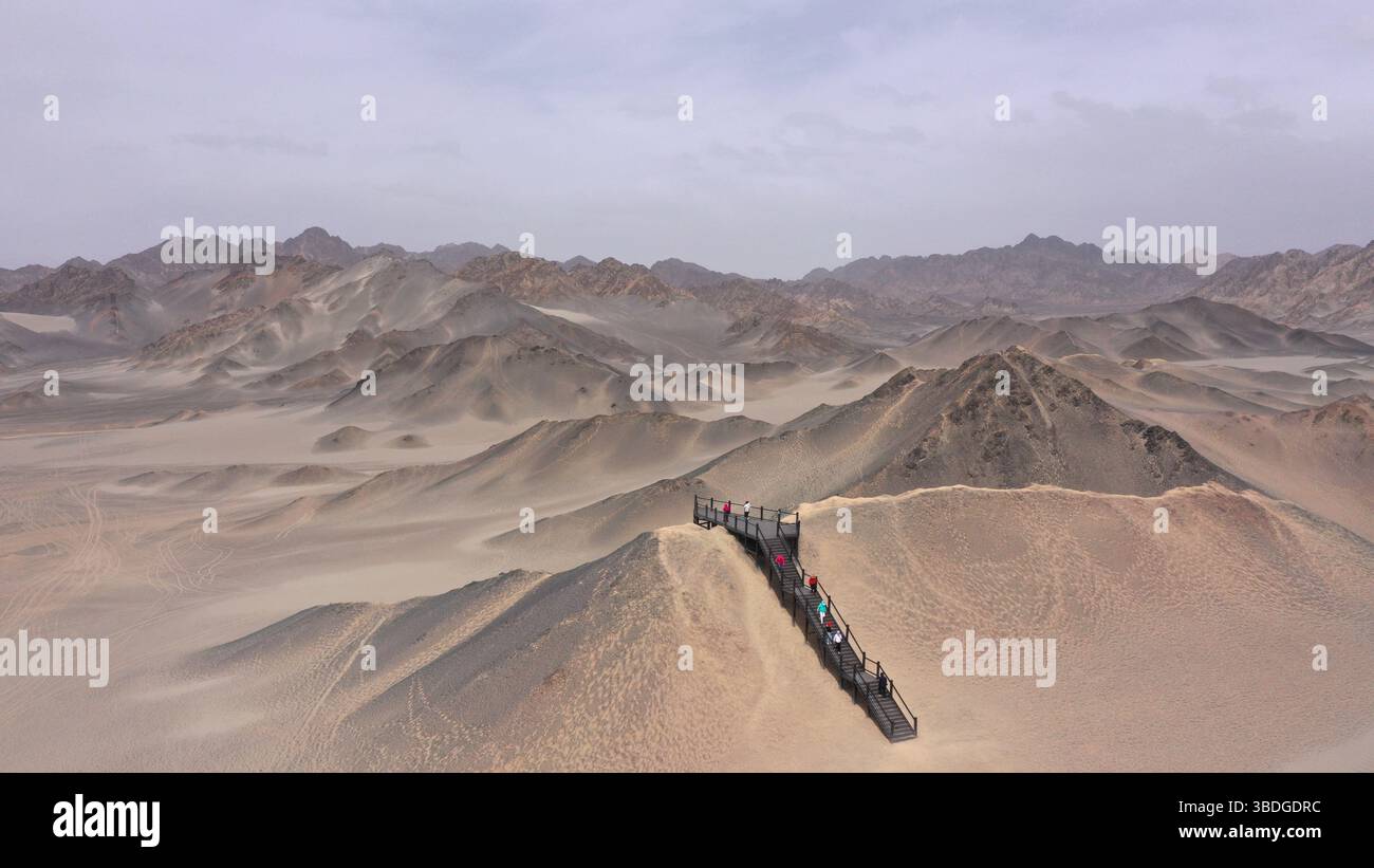 An aerial view shows the unique black Yardang landform of Heidushan ...