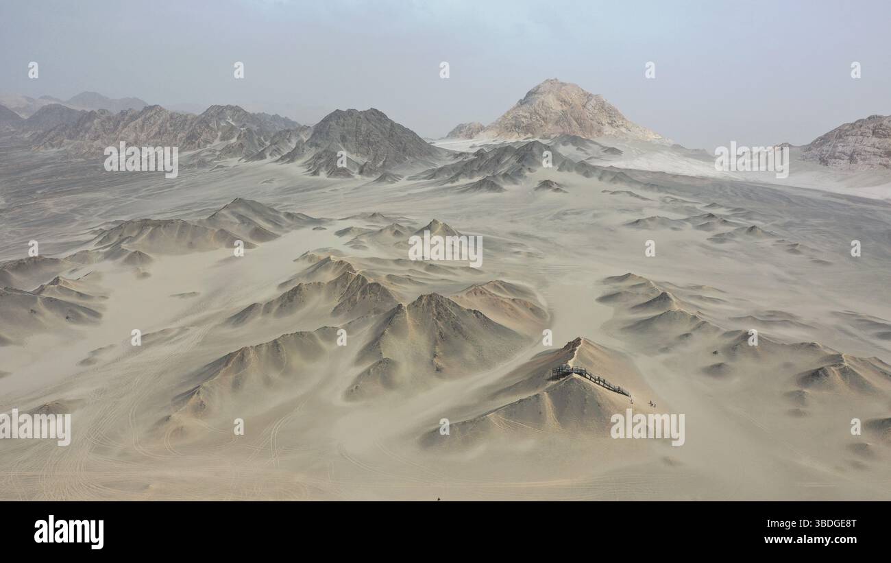 An aerial view shows the unique black Yardang landform of Heidushan ...