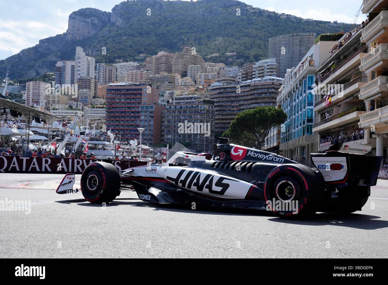 Haas driver Esteban Ocon of France steers his car during the qualifying ...