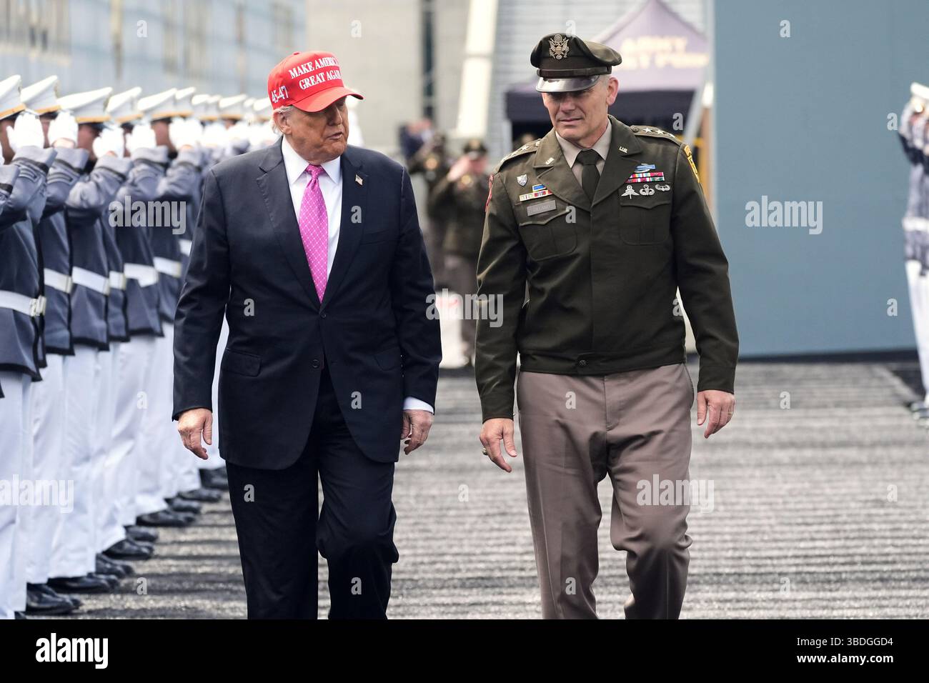 President Donald Trump, left, departs with U.S. Military Academy ...