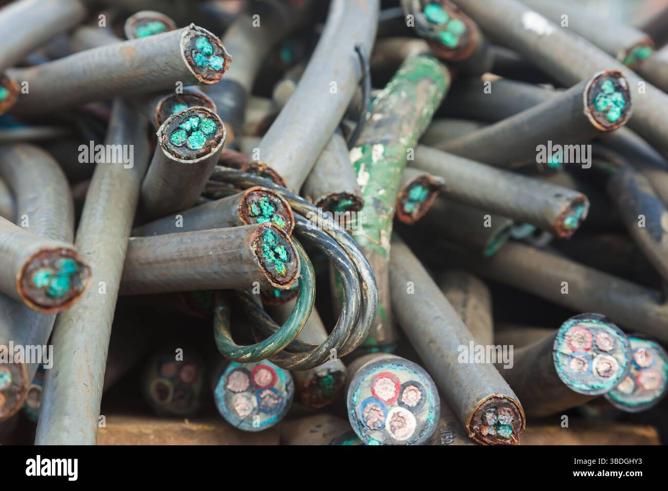 A bunch of old copper cables in a plastic sheath. Front view Stock ...
