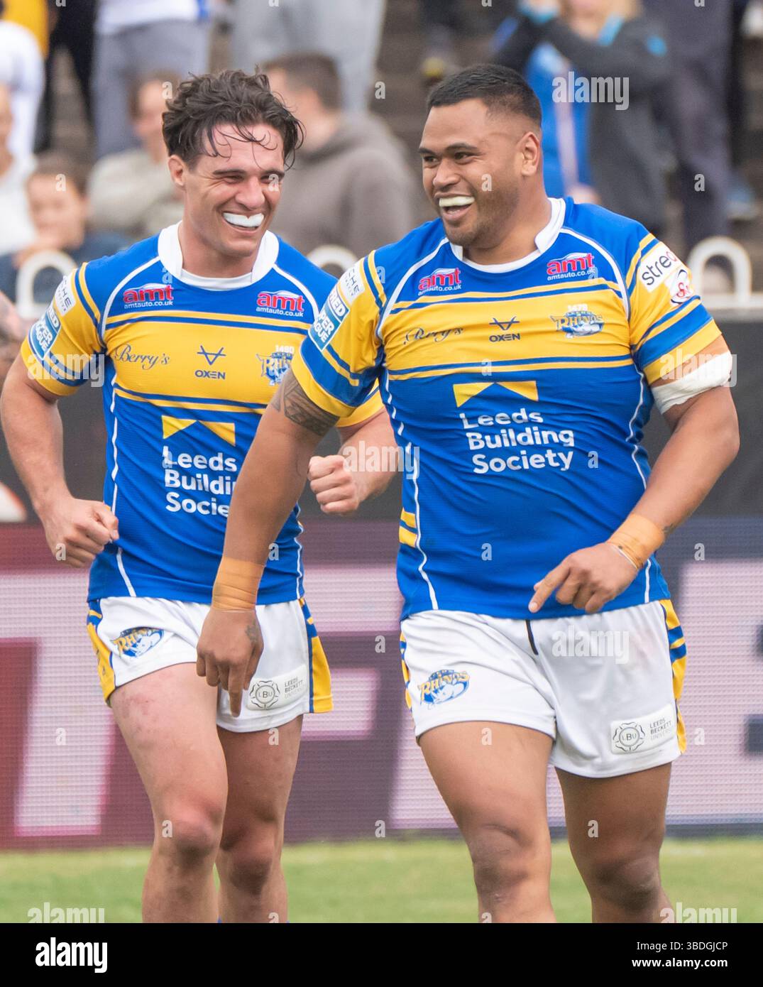 Leeds Rhinos' Sam Lisone (right) celebrates with team-mate Brodie Croft ...