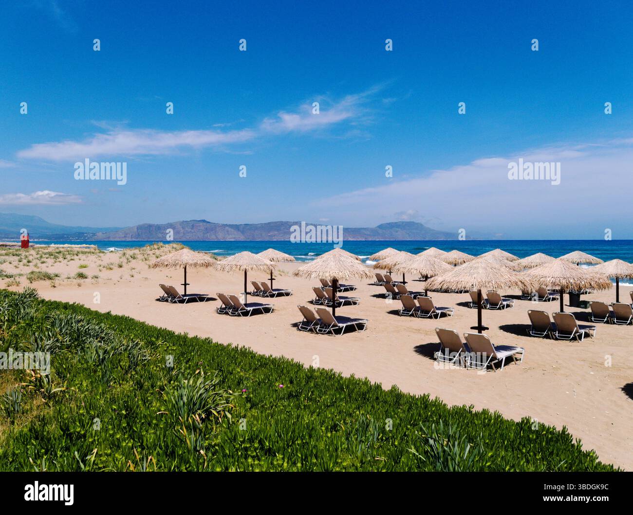 Beautiful Episkopi beach, Rethymnon, Crete, Greece. Sun loungers in ...