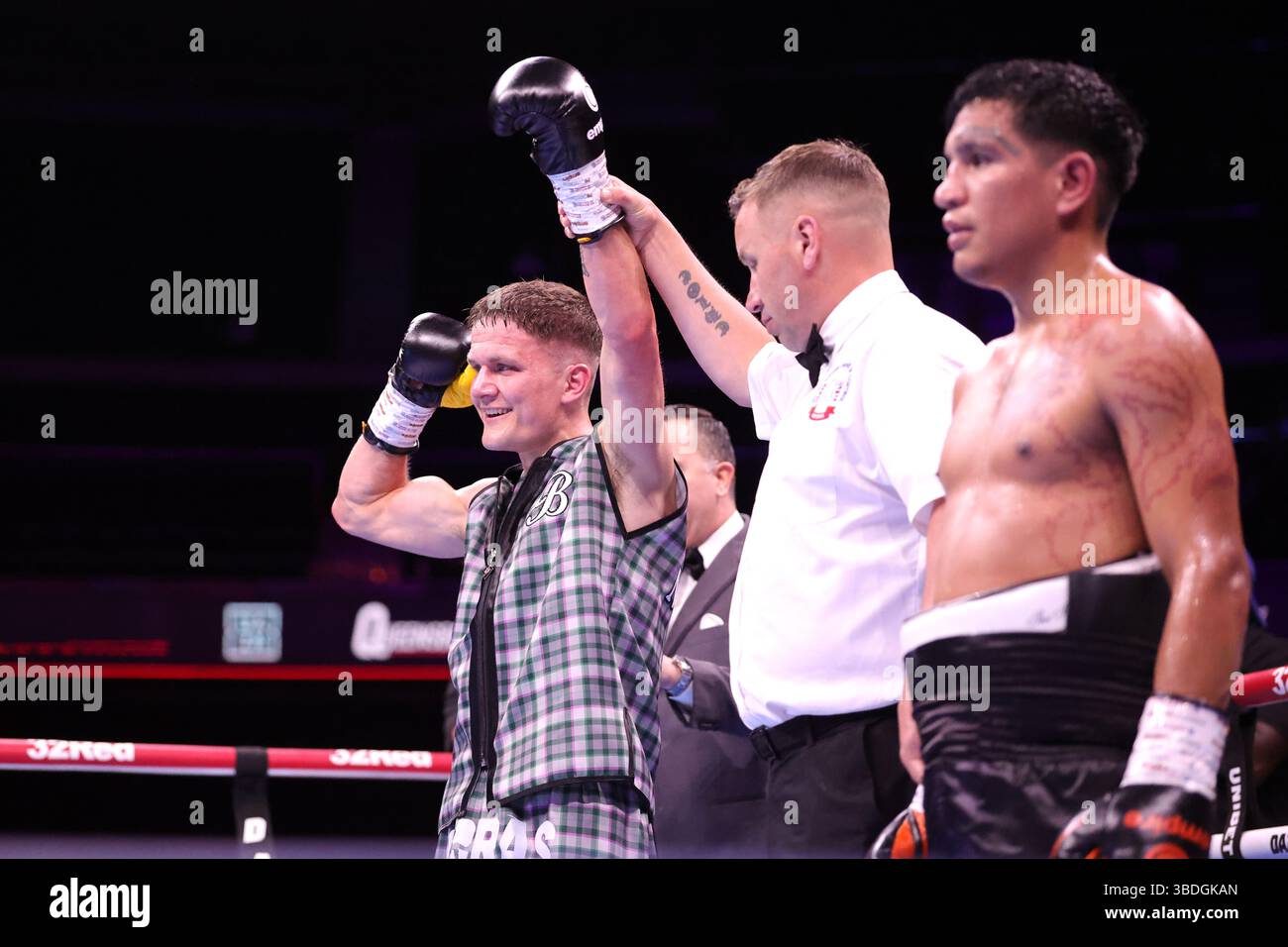 Luke Bibby (left) celebrates victory against Cesar Ignacio Paredes in ...