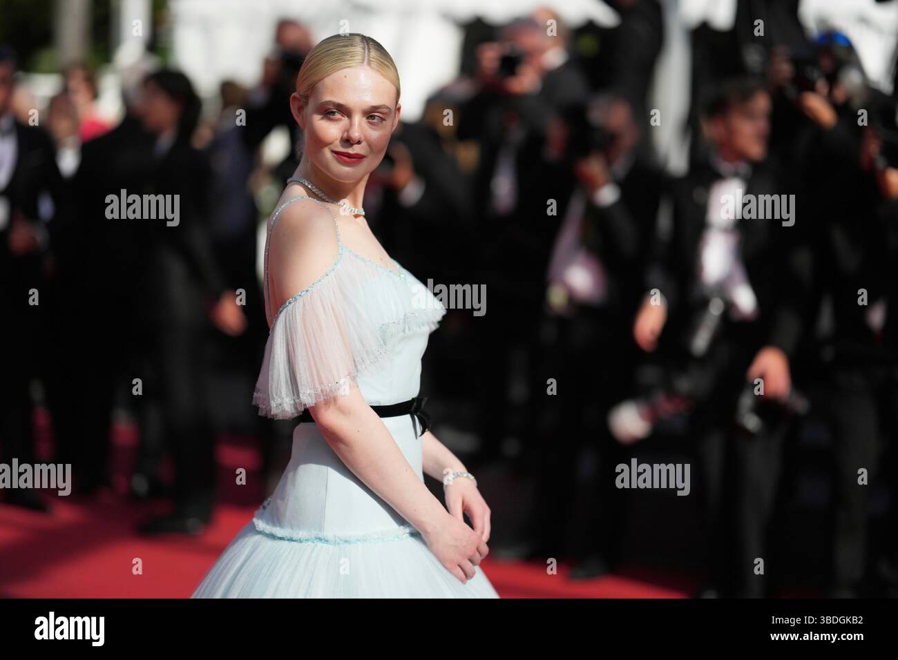 Elle Fanning poses for photographers during the awards ceremony red ...