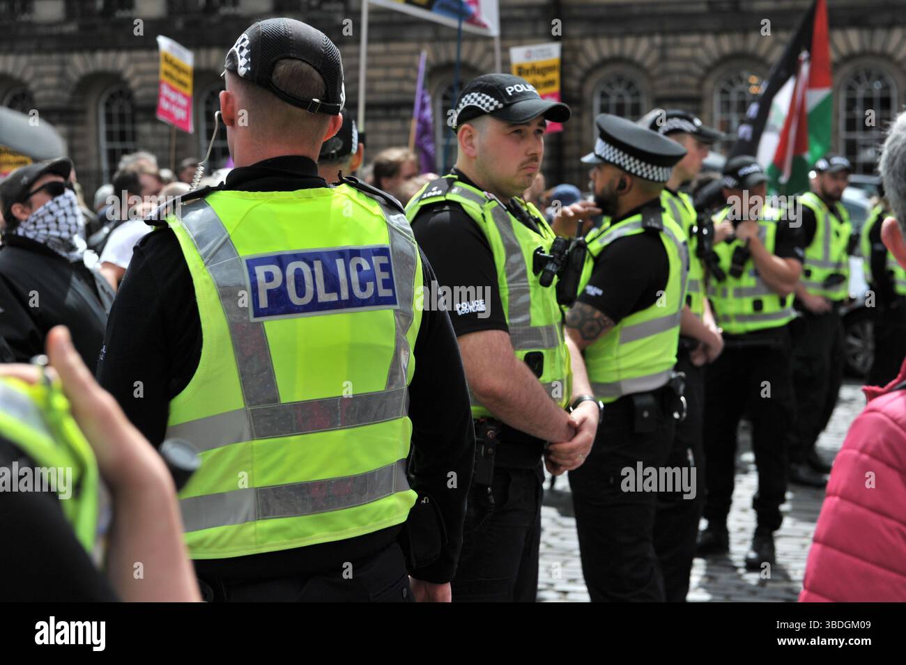 Edinburgh, UK. 24th May, 2025 - Police are seen forming a barrier to ...