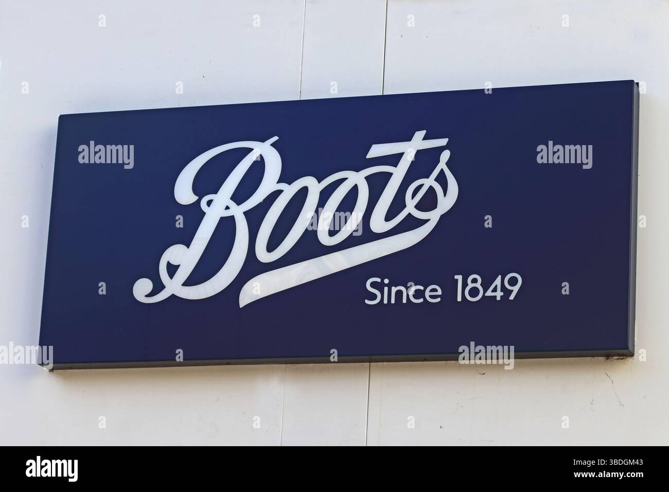 Sign over branch boots hi-res stock photography and images - Alamy