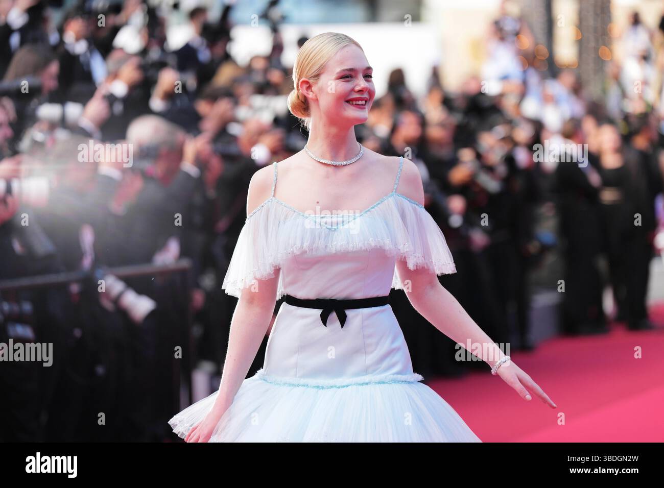 Elle Fanning poses for photographers during the awards ceremony red ...