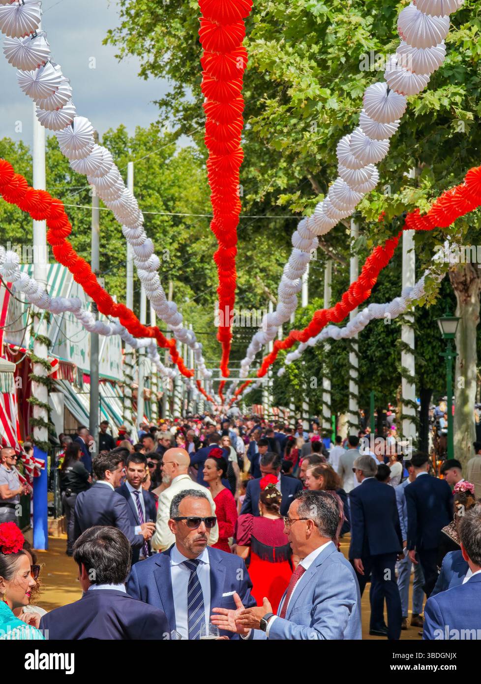 Seville, Spain, May 8 2025, Crowds gather at the Feria de Abril in ...