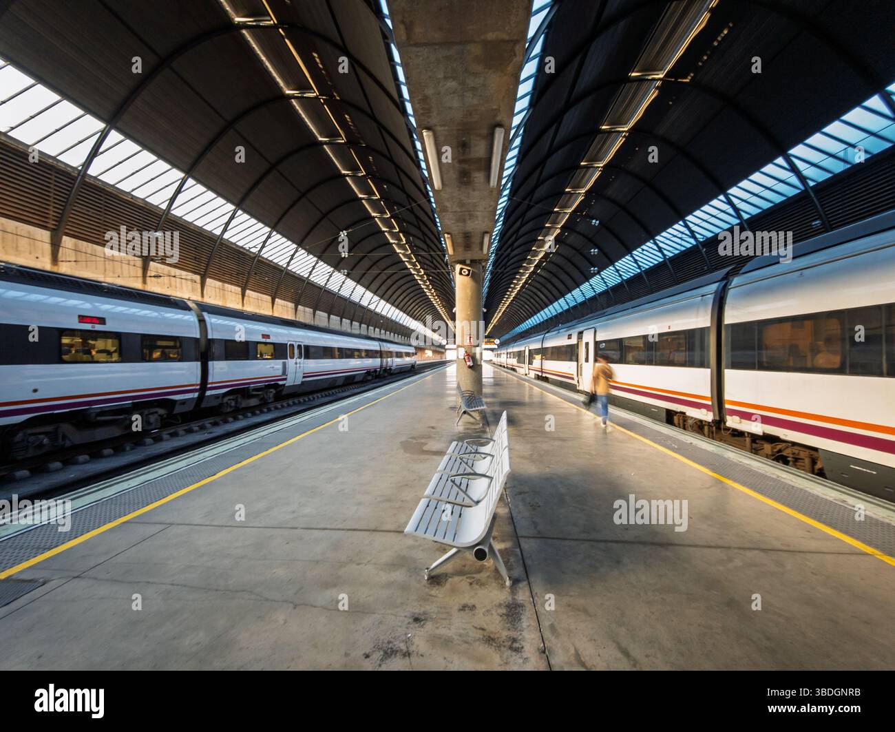 Travelers move through the spacious platforms of Santa Justa Railroad ...