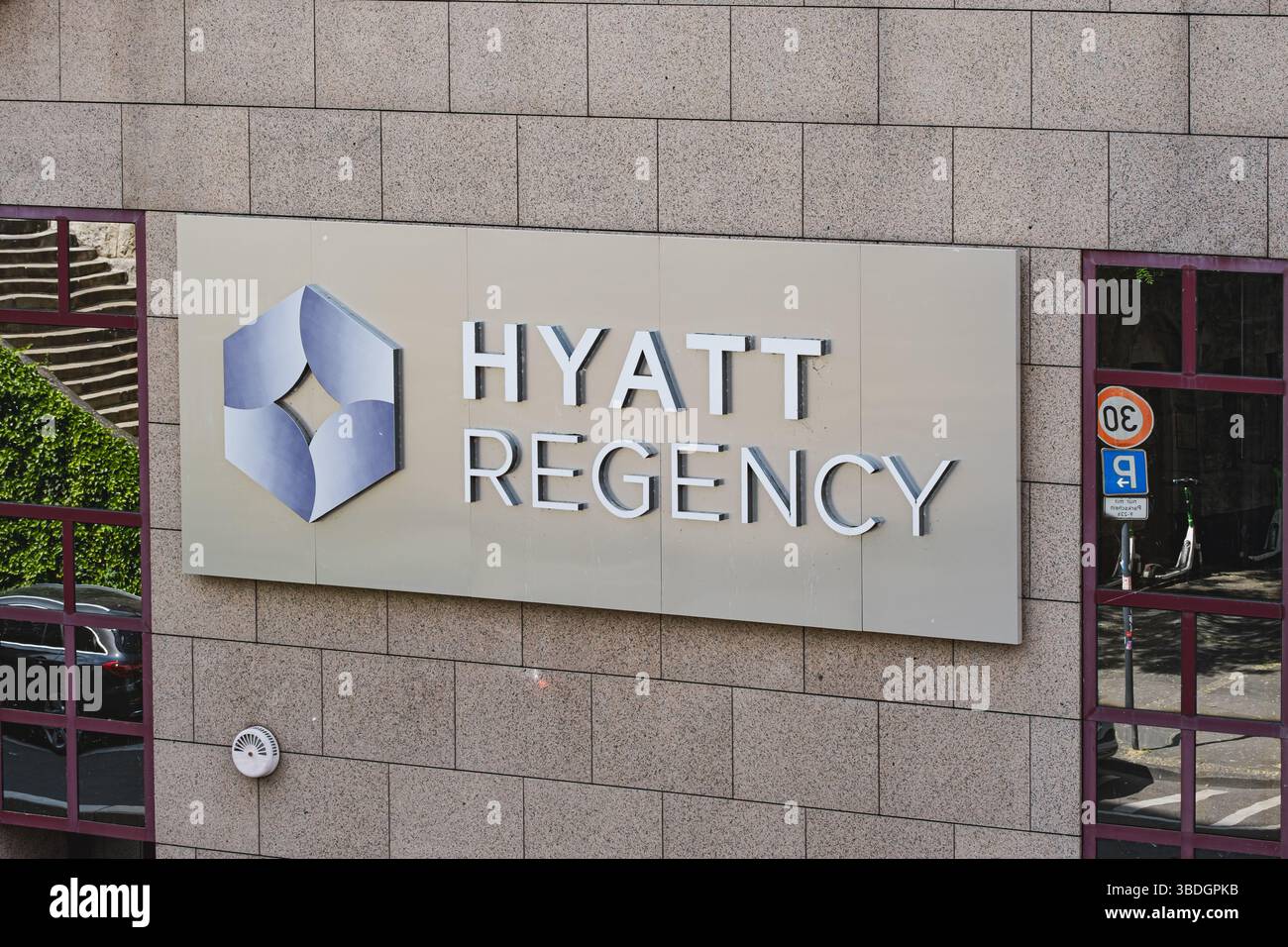 Hyatt Regency hotel sign on an office building wall Stock Photo - Alamy