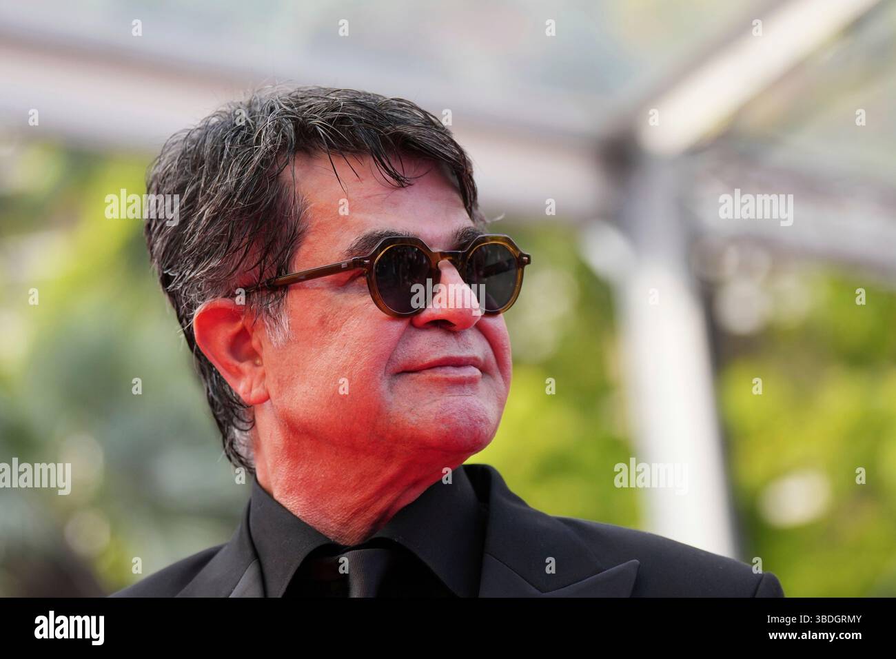 Jafar Panahi poses for photographers during the awards ceremony red ...