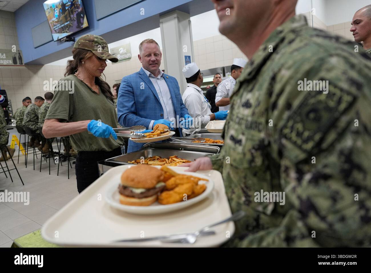 U.S. Homeland Security Secretary Kristi Noem, left, and Sean Plankey ...