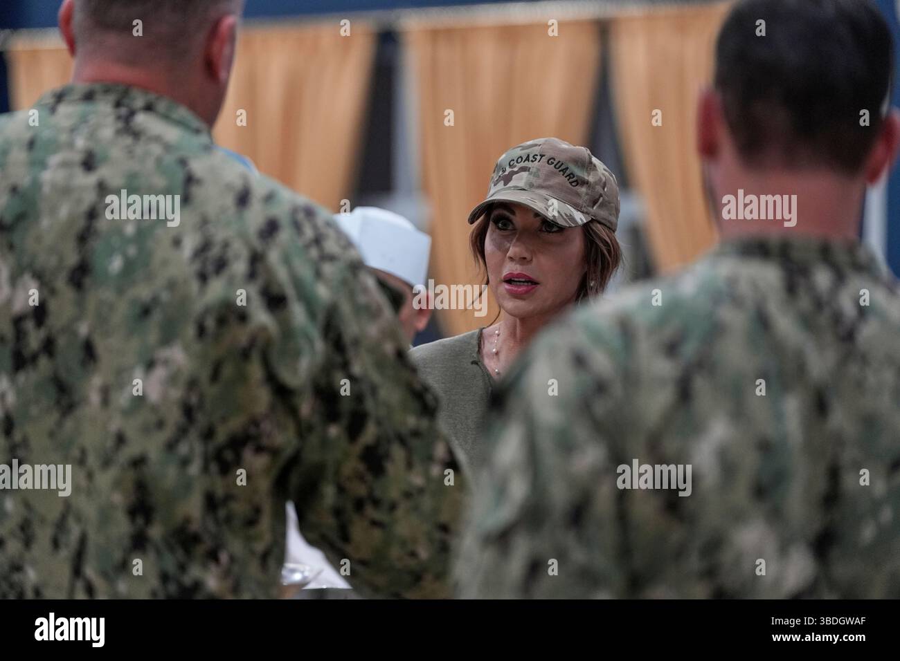 U.S. Homeland Security Secretary Kristi Noem, left, and Sean Plankey ...