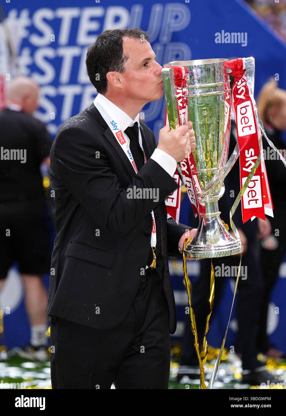 Sunderland manager Regis Le Bris lifts the trophy following the Sky Bet ...