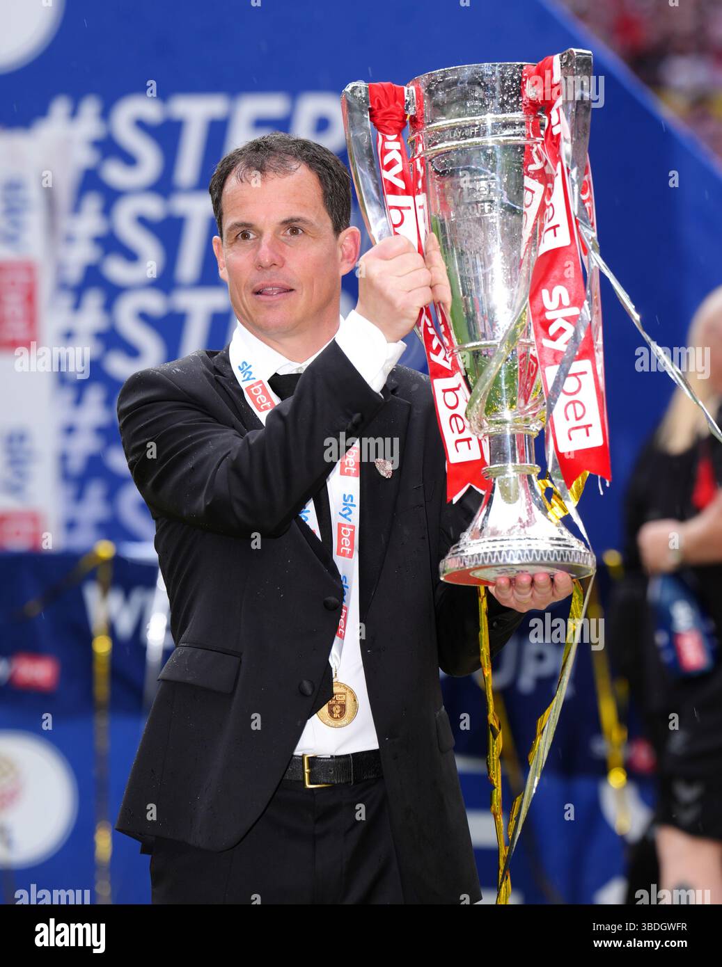 Sunderland manager Regis Le Bris lifts the trophy following the Sky Bet ...