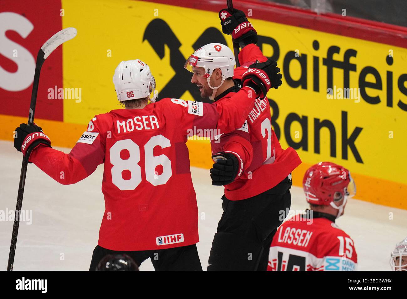 Switzerland's Janis Moser and Nino Niederreiter celebrate after a goal ...